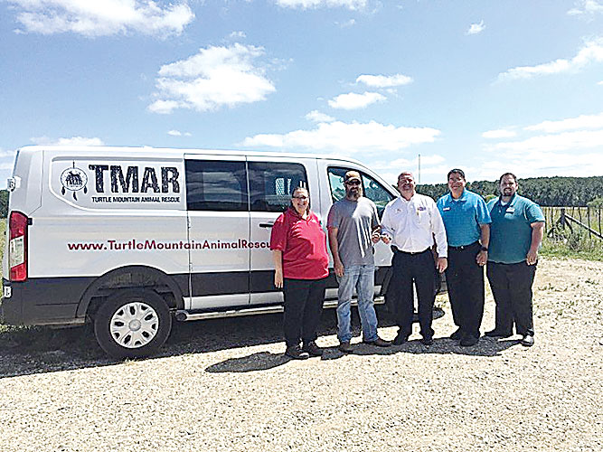 Bergstrom Cars presents van to Turtle Mountain Animal Rescue | News ...